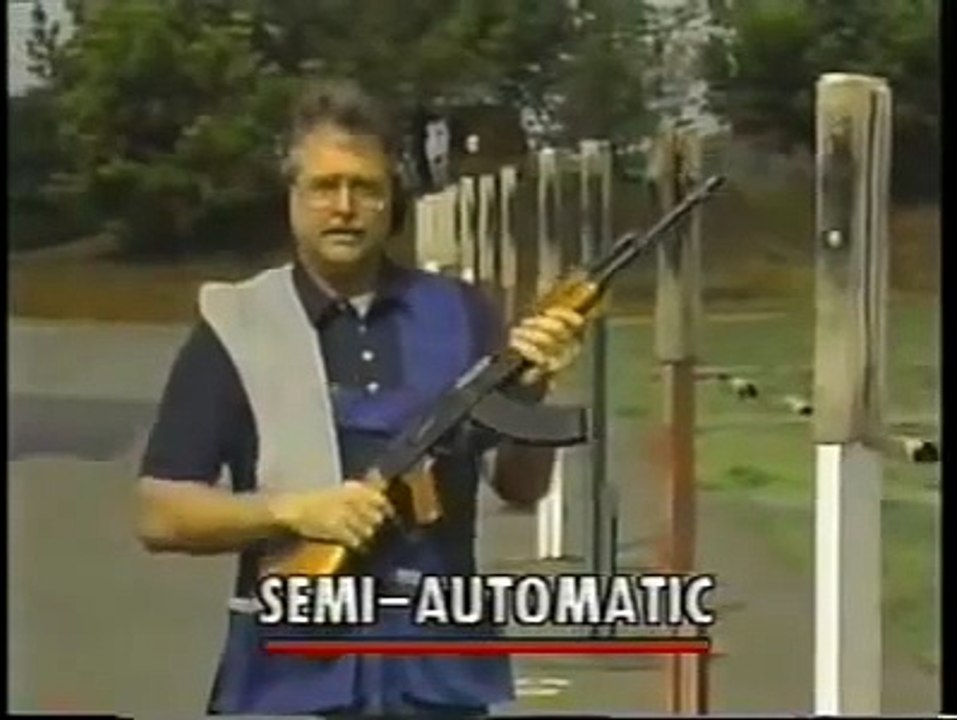 A sheriff is showing the differences between fully automatic, semi ...
