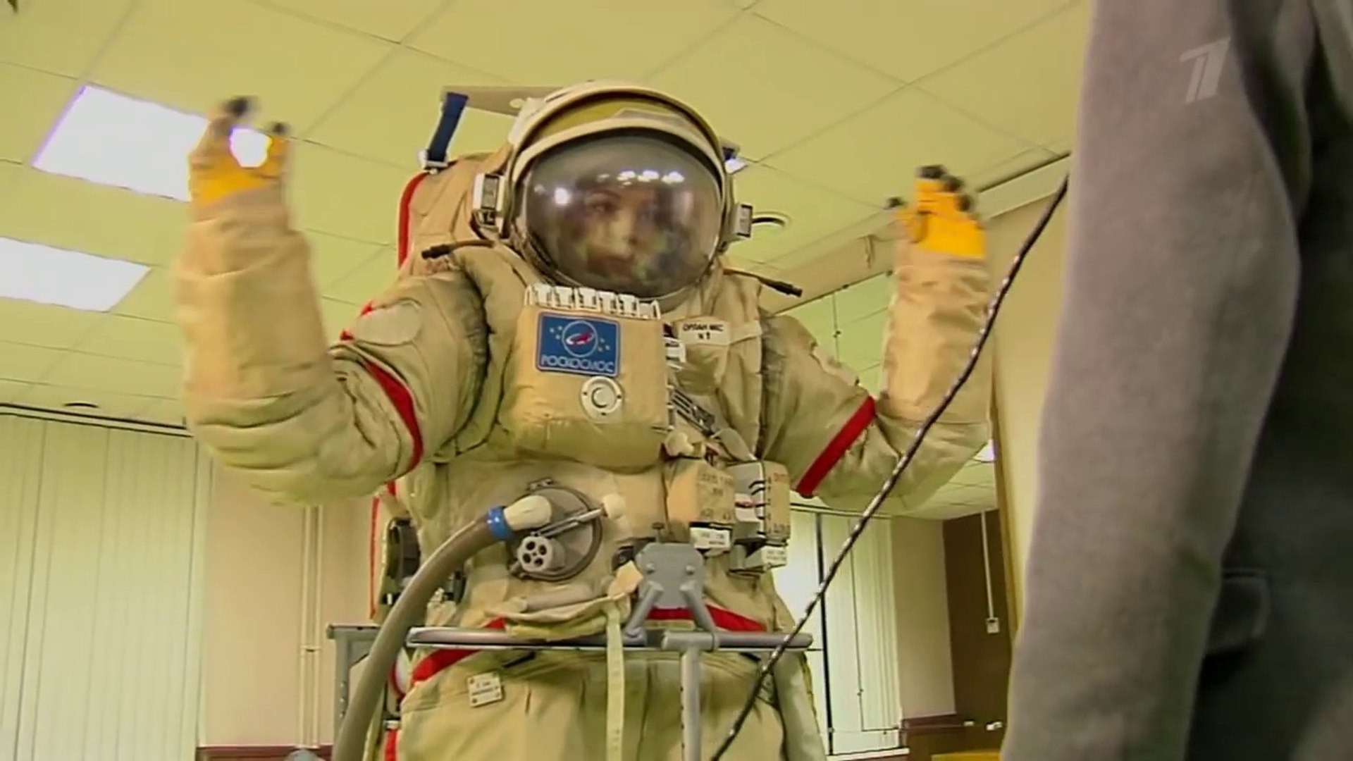 Putting On Orlan Space Suit