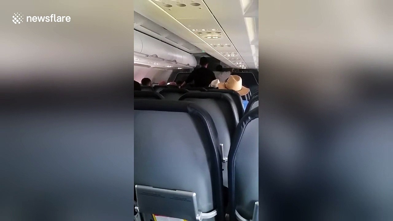 Rude plane passengers get angry as they are not let off the aircraft ...