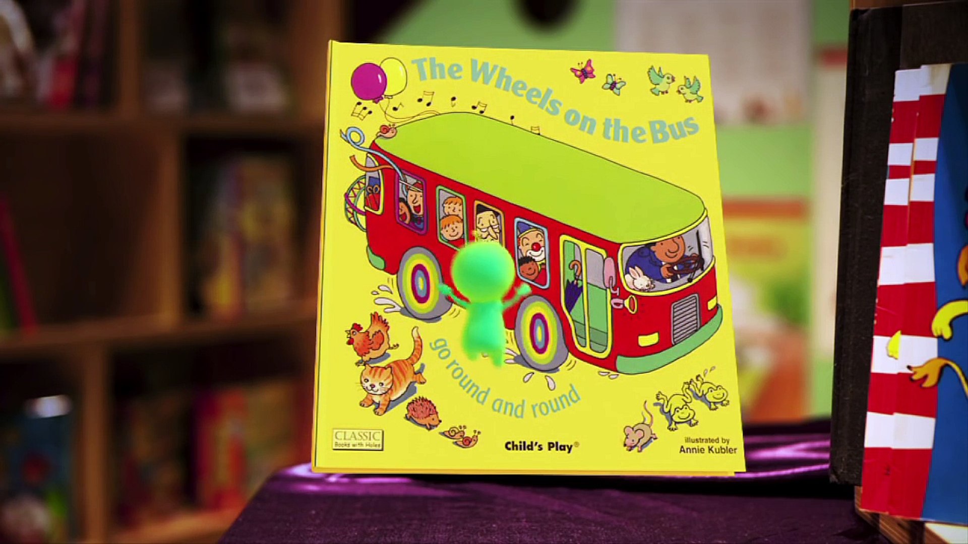 Wheels On The Bus Go Round And Round Classic Book With Holes The