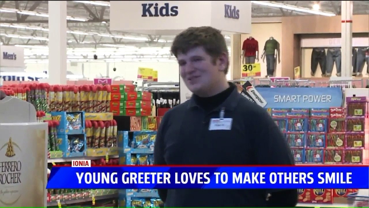 Enthusiastic Supermarket Greeter Puts a Smile on Customer`s Faces ...