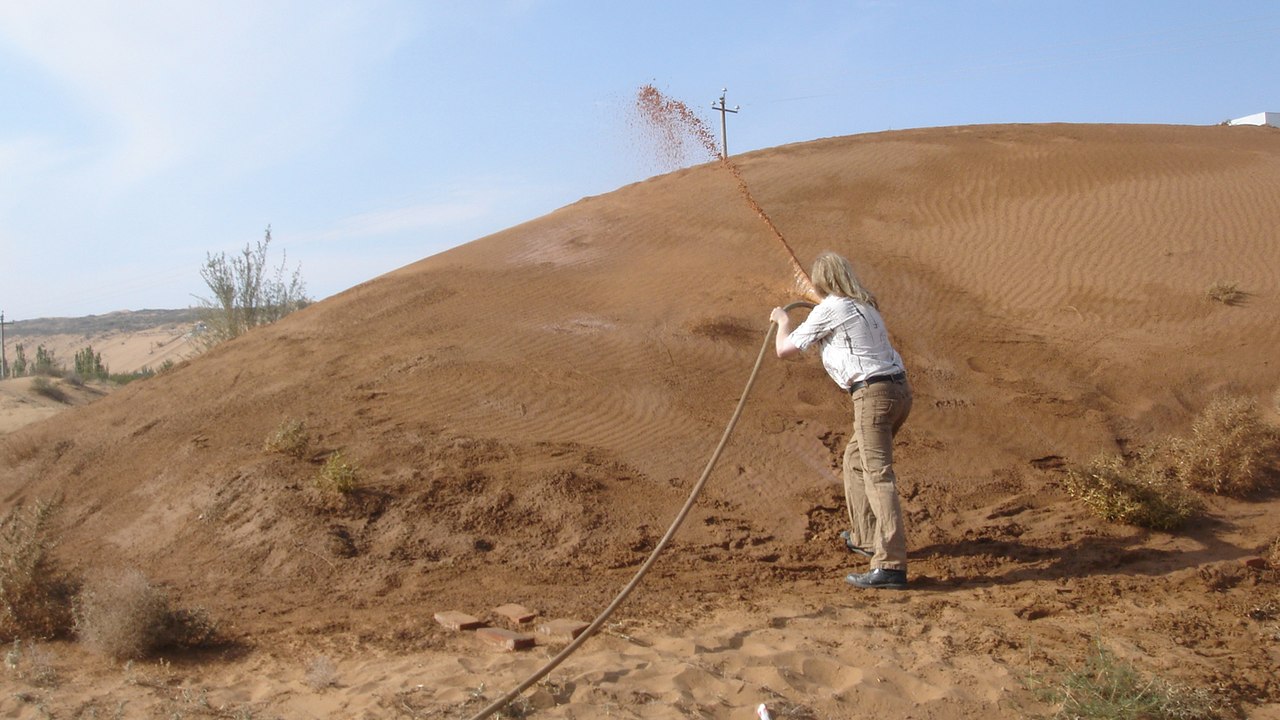 Spraying this material on desert sand will turn it into green, fertile ...