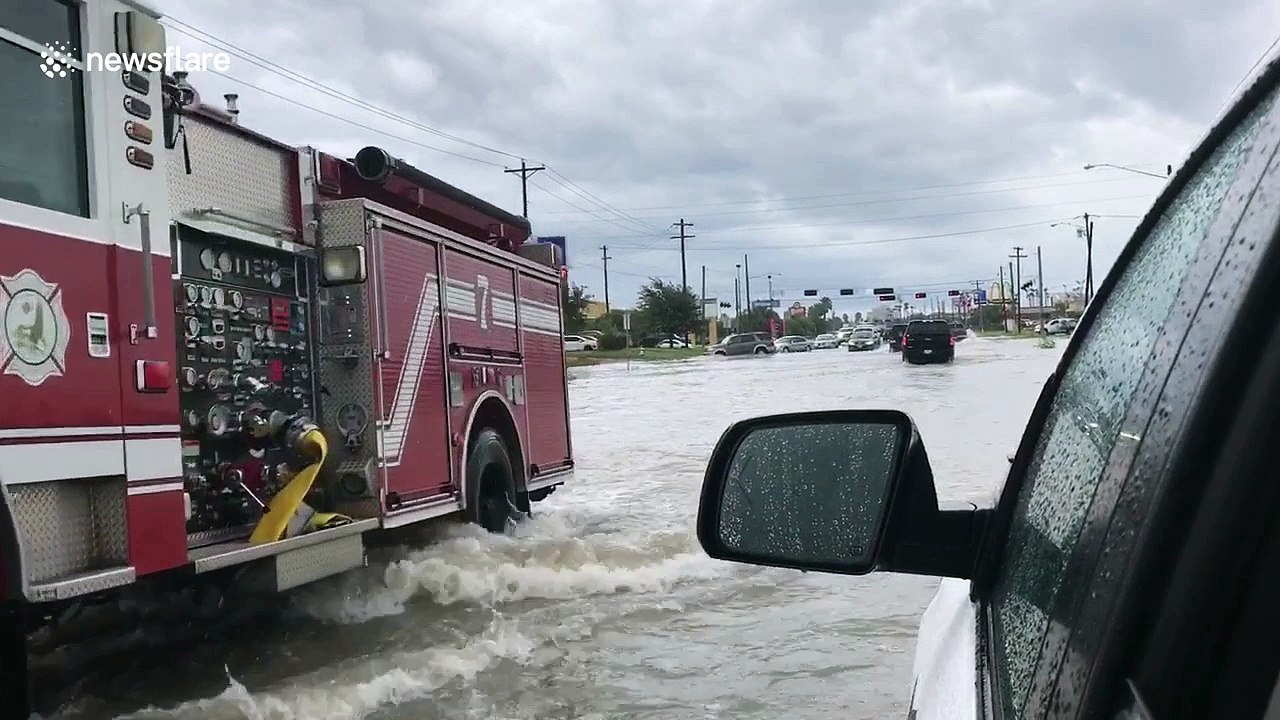 Footage captures cars driving through flooded streets of McAllen, Texas ...