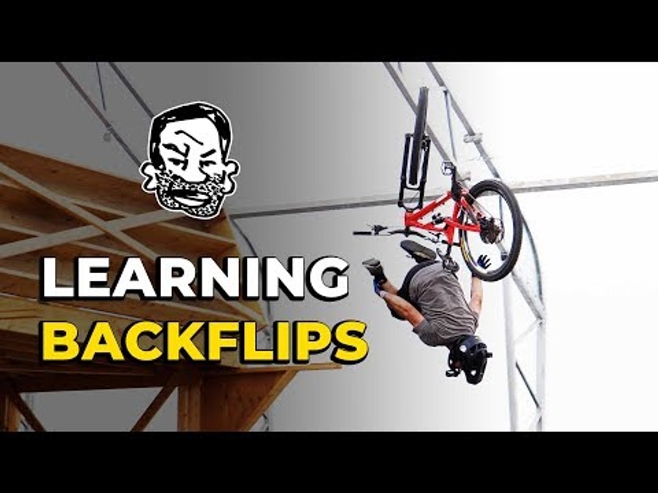 Learning how to backflip my mountain bike | Featuring Skills with Phil ...