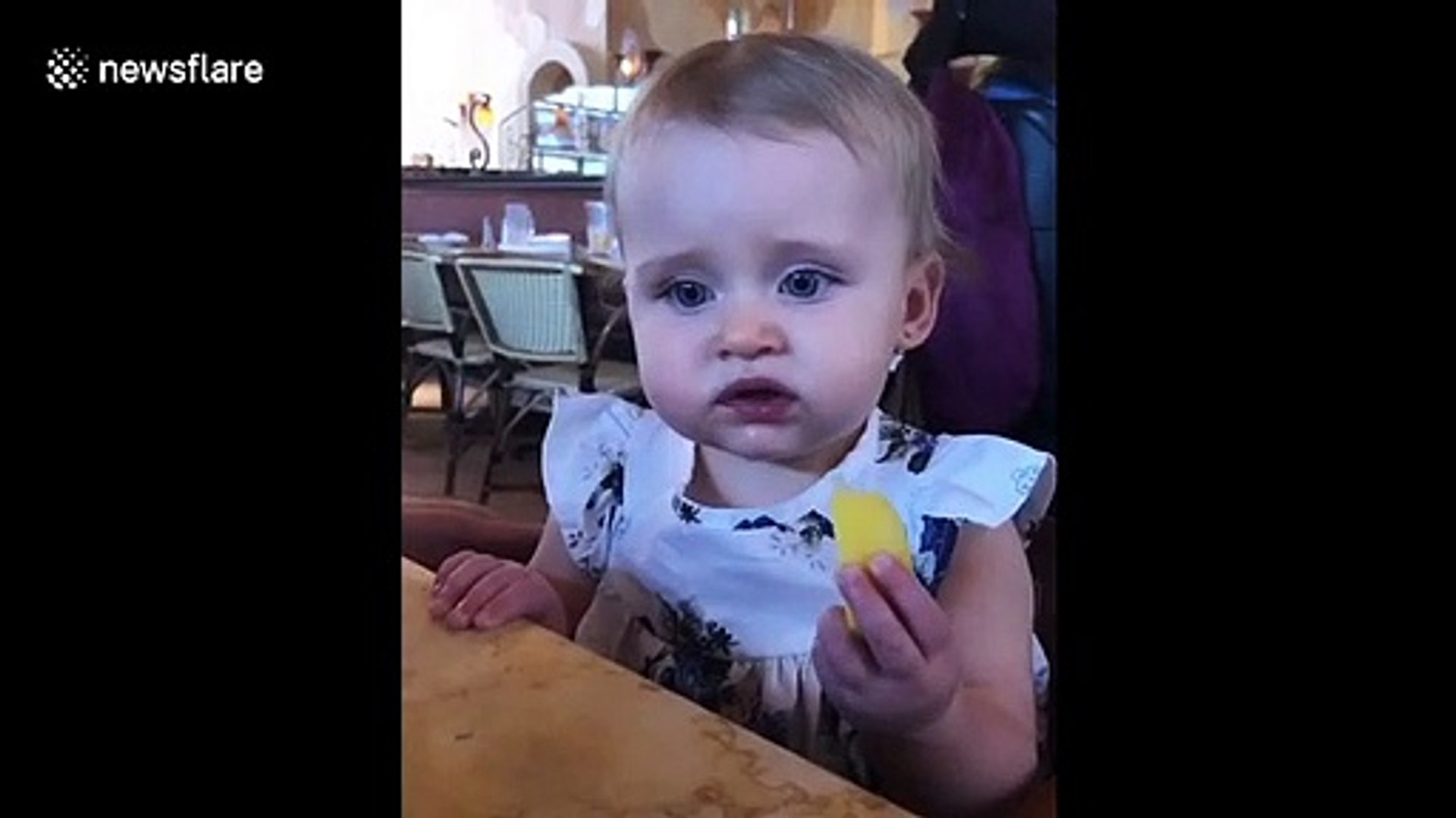 Baby Eating Lemon Gif