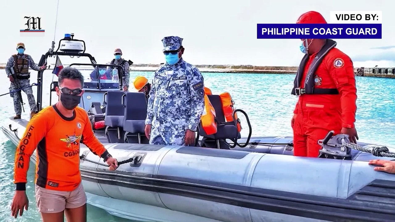 PCG holds 'symbolic' raising of PH flag in West Philippine Sea - video ...