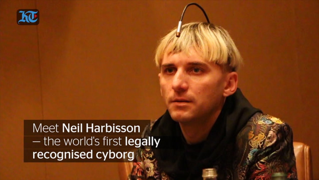 Meet Neil Harbisson: With an antenna implanted into his skull, he's the ...