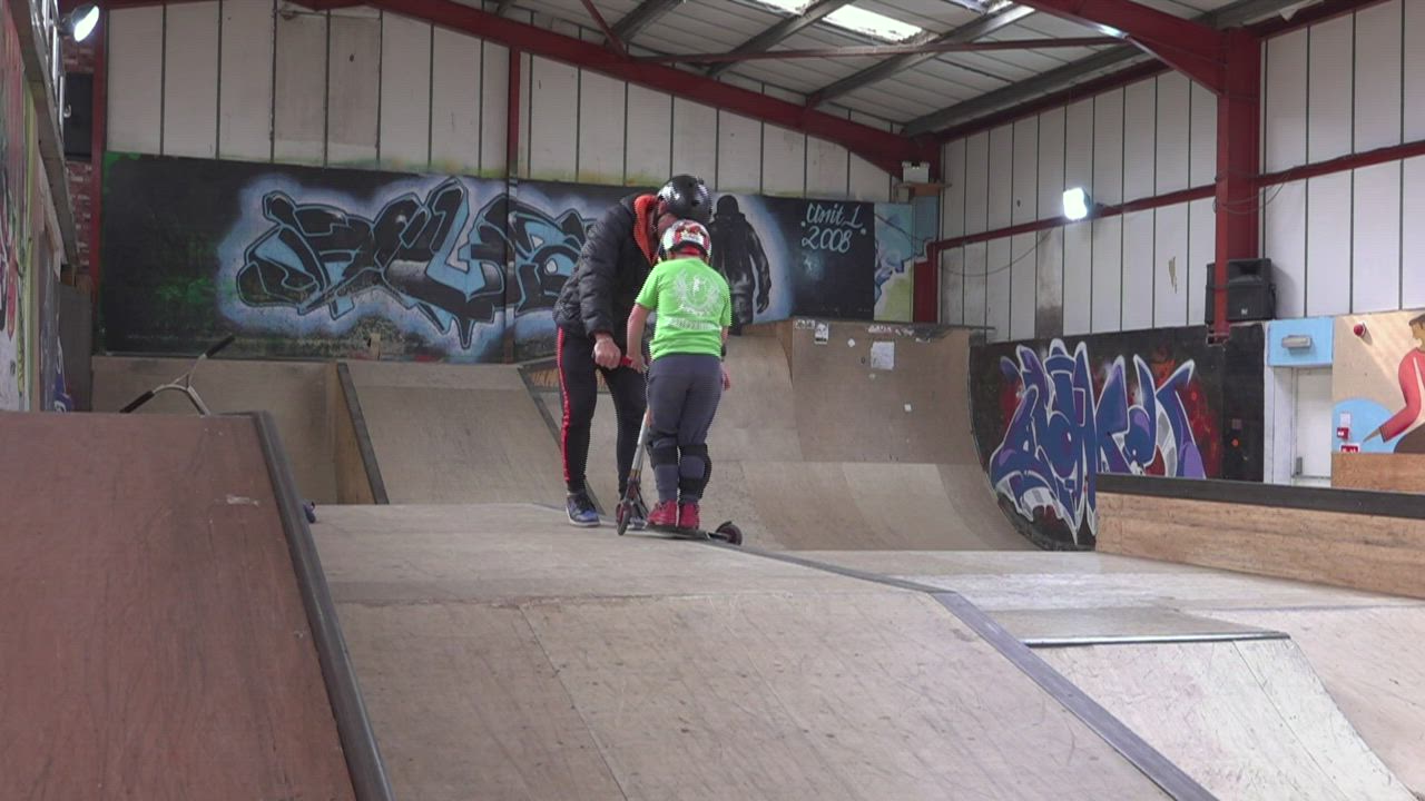 World scooting champion visits children at a Skate Park in Rochester