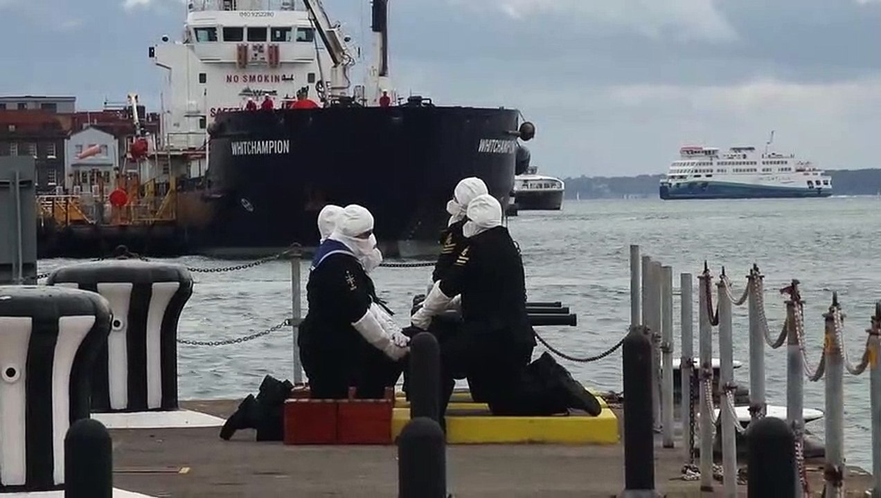 Members of the Royal Navy conduct a 117-gun salute in Portsmouth Naval ...