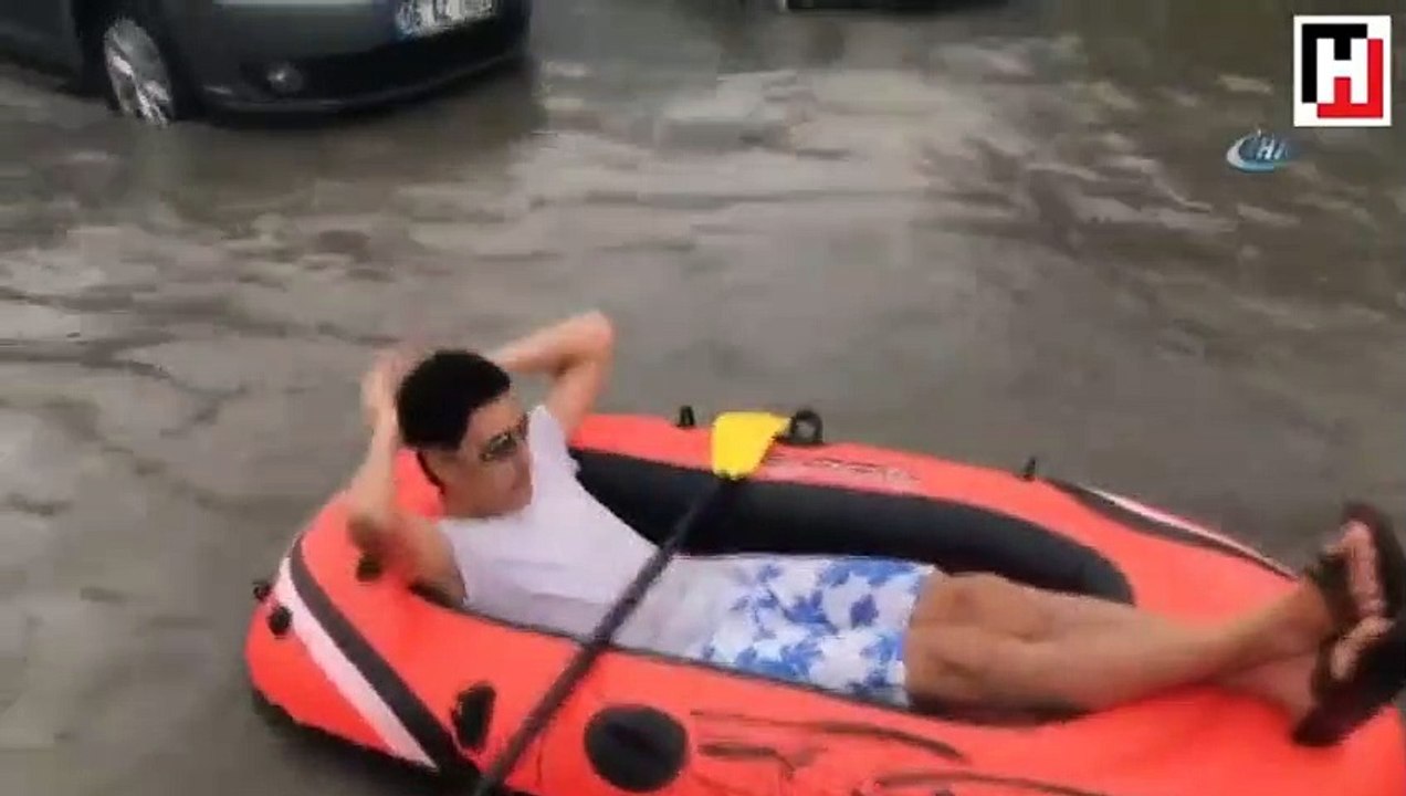 Young man goes rafting in flood water in Ankara - Dailymotion Video