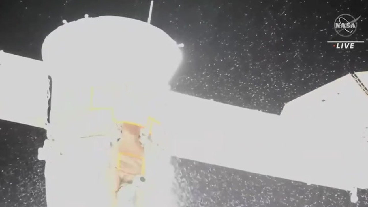 Nasa footage shows particles spraying into space off Russian capsule ...