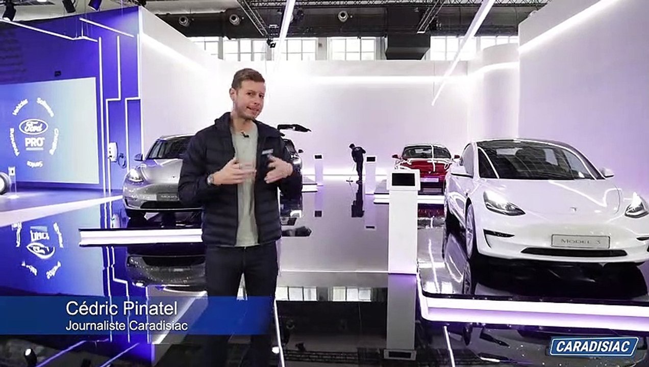 En direct du salon de Bruxelles 2023 - Le stand Tesla - Vidéo Dailymotion