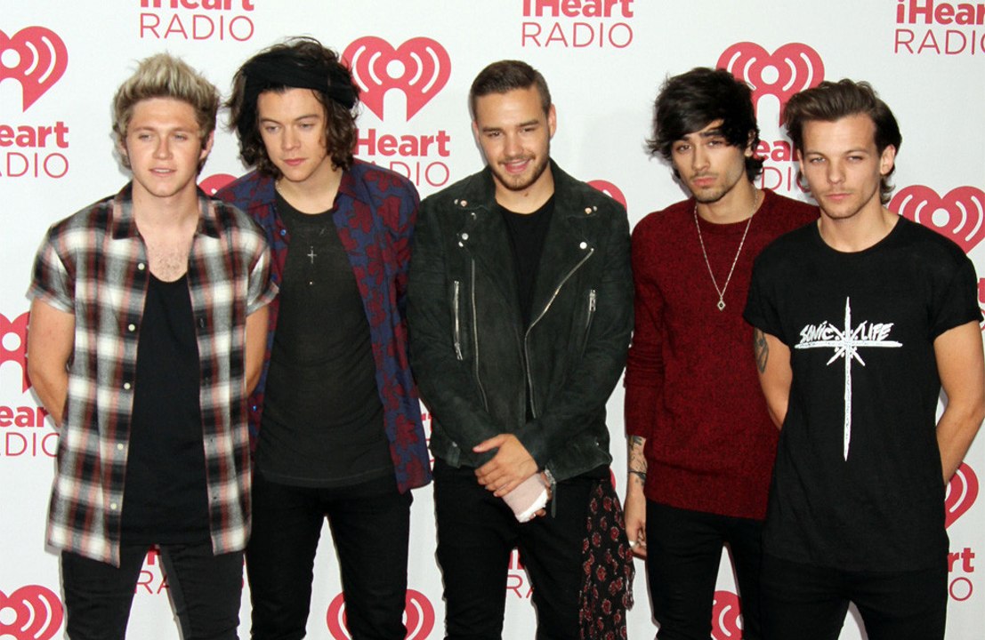 Louis Tomlinson wants One Direction to get 'back together at some point ...
