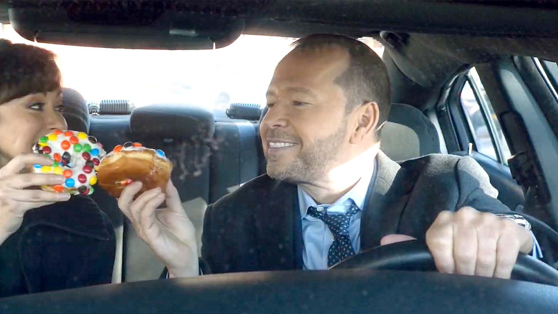 Man Eating Fast Food In A Car