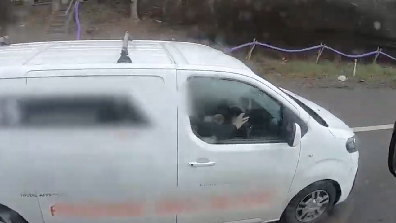 Motorists caught watching films on mobile phones while driving on ...