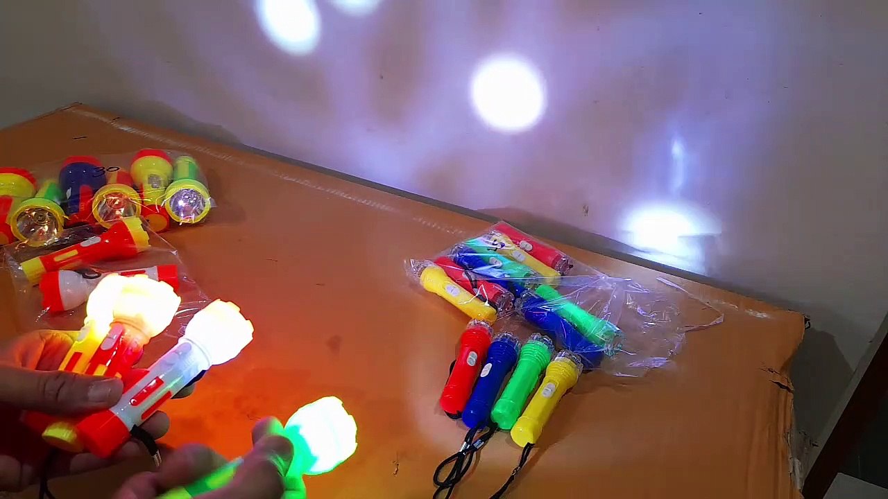 Unboxing and Review of Small Torch Light for Kids Torch Projector ...