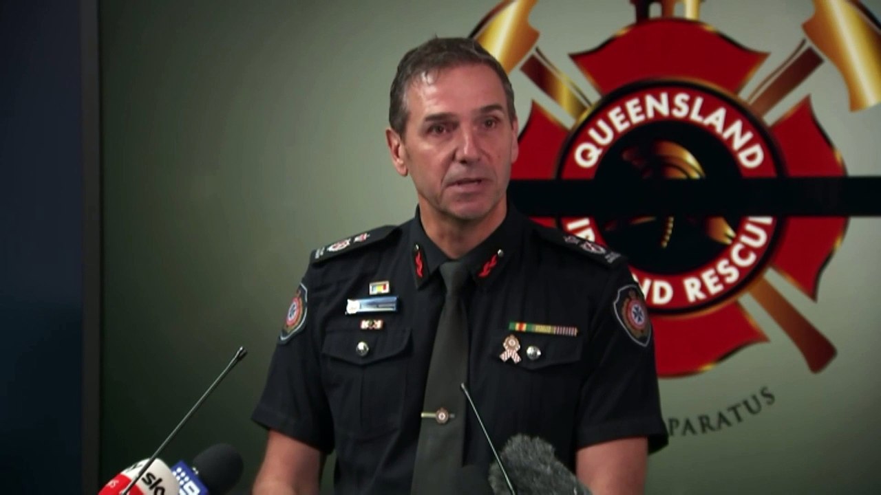 QFES responds after firefighter dies following factory fire in ...