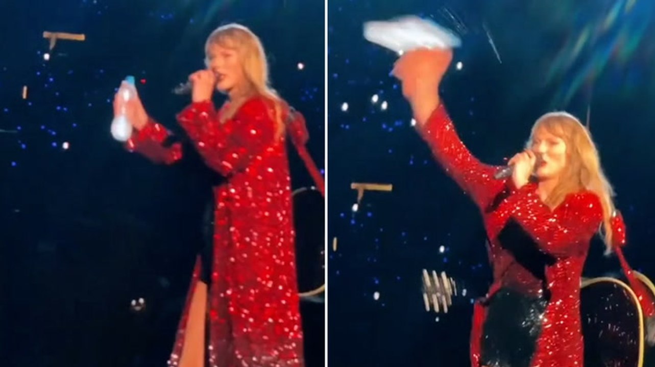 Taylor Swift throws water bottle to fans during Rio concert - video ...
