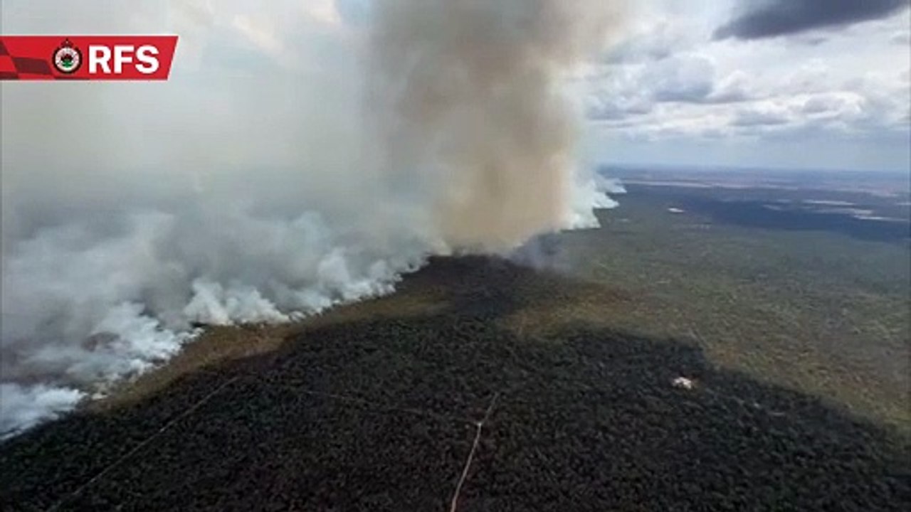 Rain on the Duck Creek Pilliga Forest Fire on December 19 - video ...