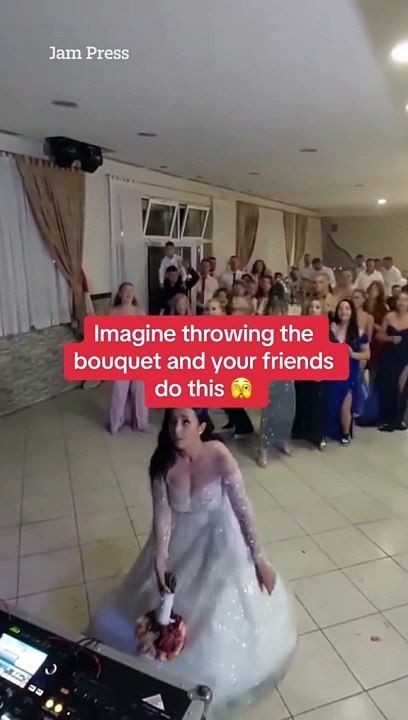 Watch the moment a bride throws her bouquet of flowers and her friends ...