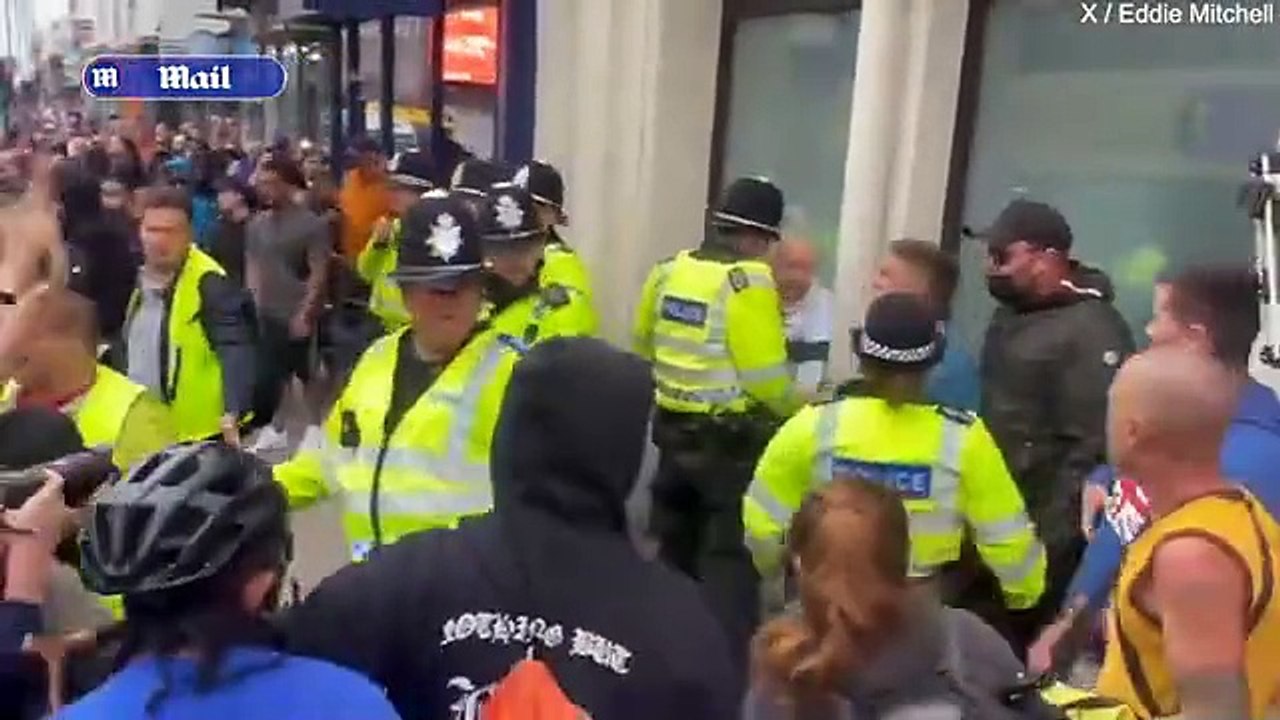 Tensions rise between protesters in Brighton amid planned riots - video ...