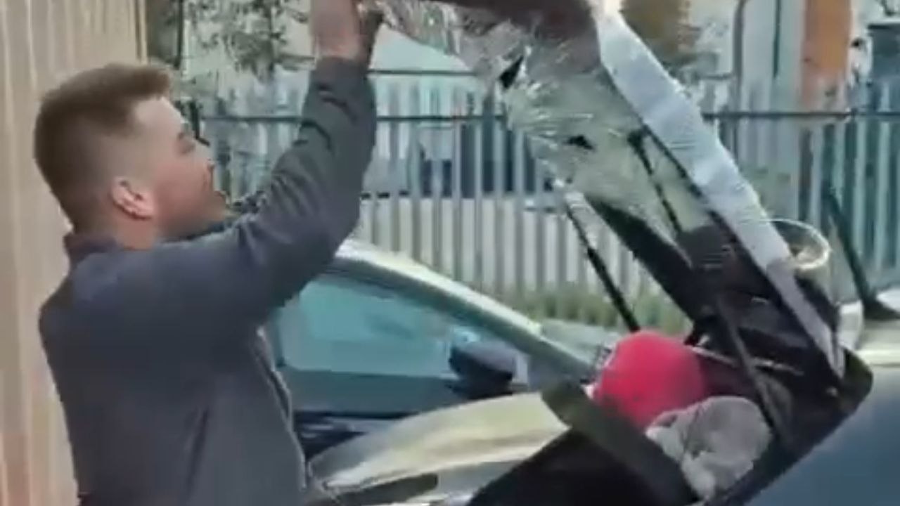 Young man's car gets wrapped in cling film by colleagues while he's at ...