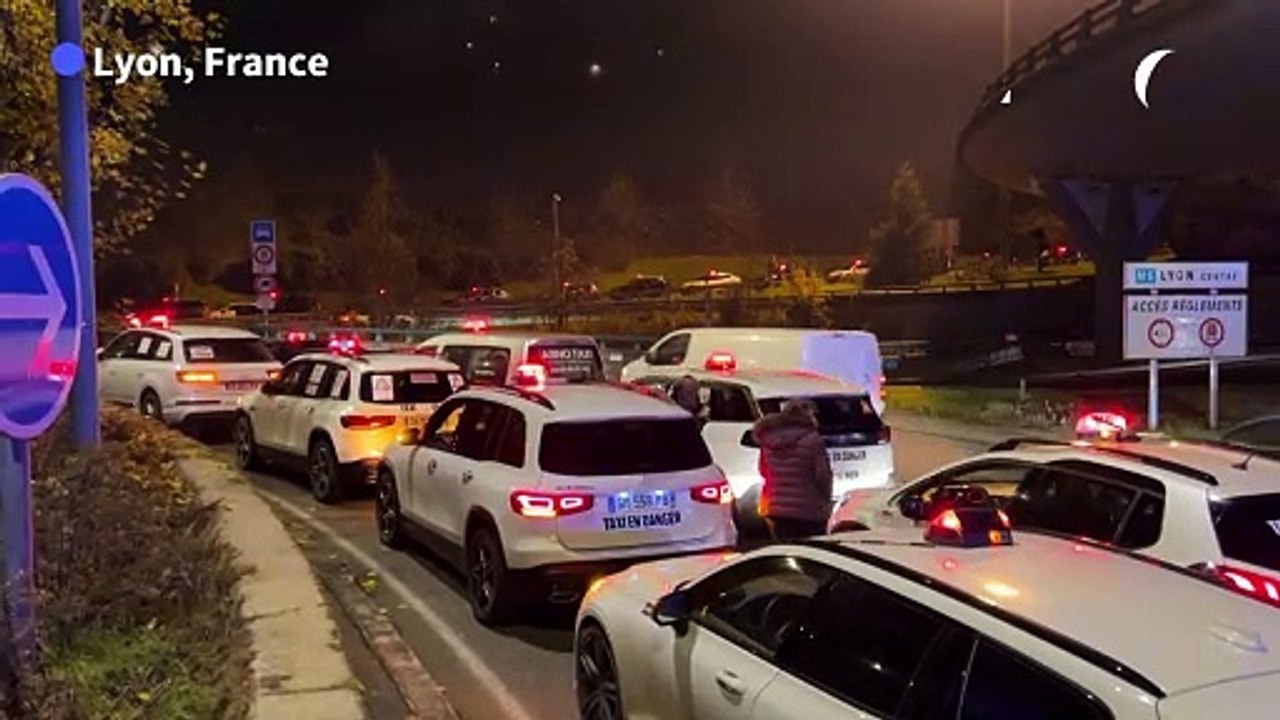 Protesting taxi drivers block traffic around Lyon, France - video ...