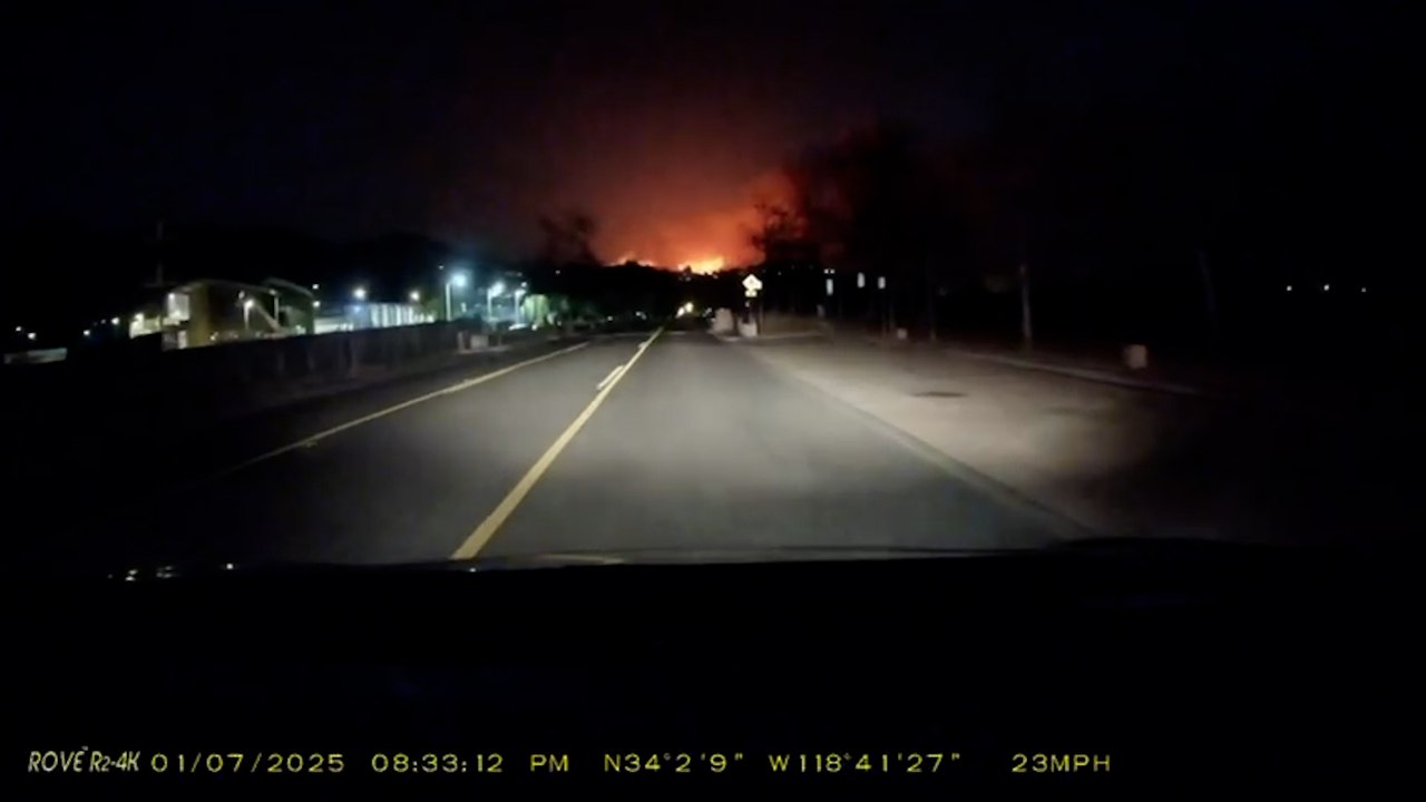 Dashcam footage shows Pacific Palisades wildfire burning at night ...