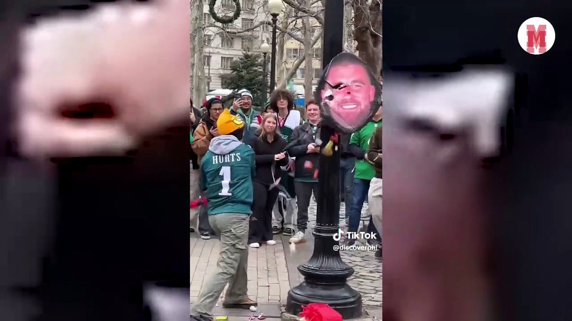 Eagles fans made a piñata with Travis Kelce's face on it and people hit ...