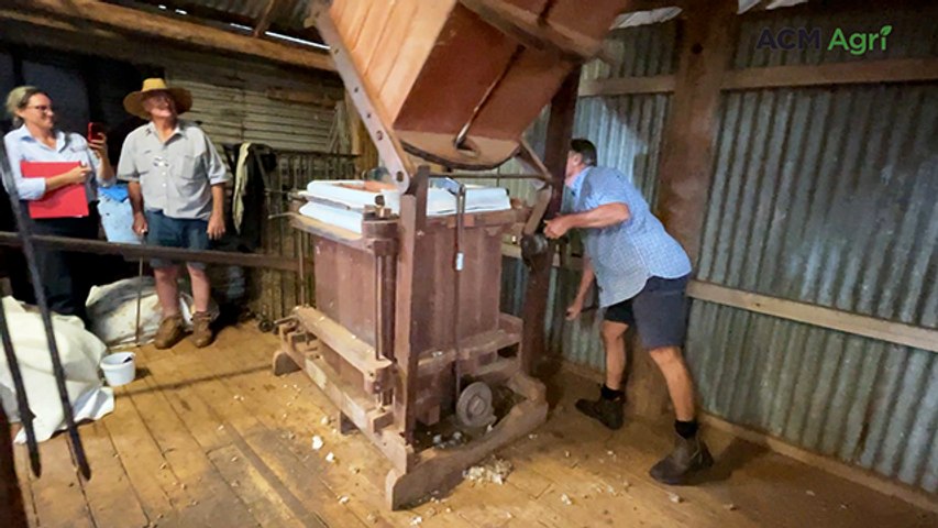 Antique wool press demonstration | The Land | NSW