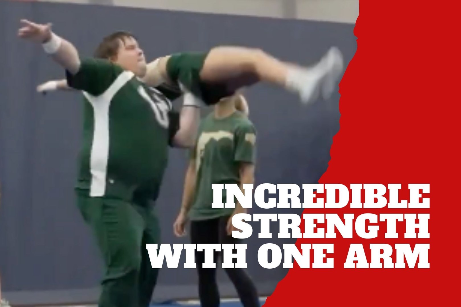 Student lifts girl with one hand during impressive cheerleading routine ...
