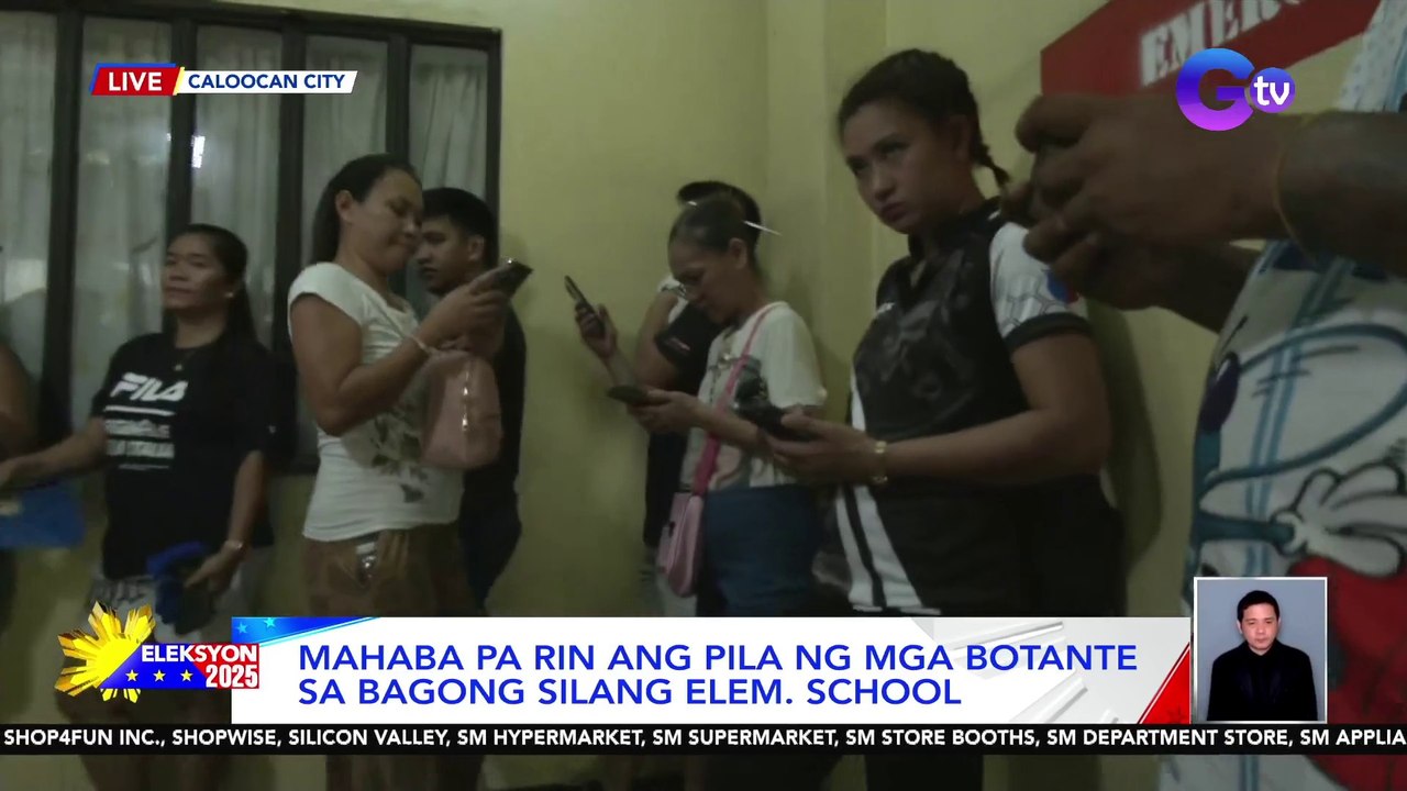 Mahaba pa rin ang pila ng mga botante sa Bagong Silang Elem. School ...