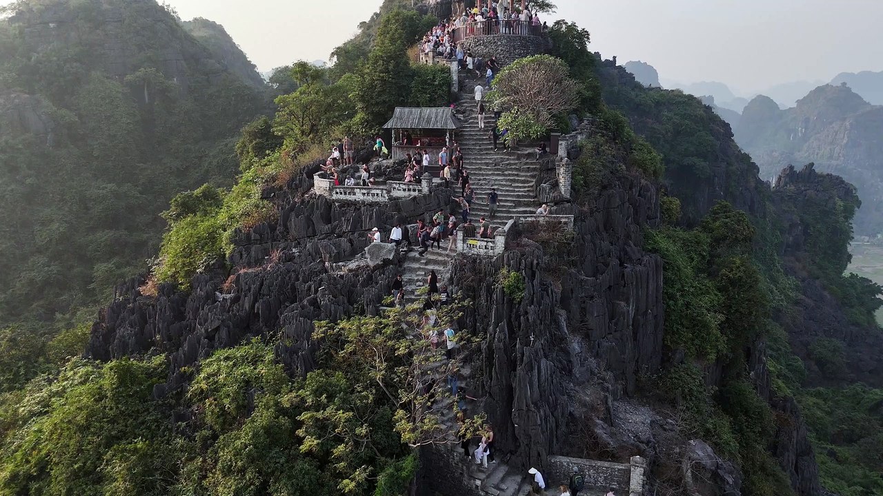 Aerial View of Mua Cave Mountain Steps at Sunset - video Dailymotion