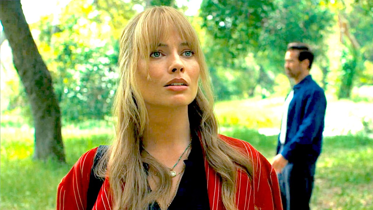 Margot Robbie and Colin Farrell Take a Surreal Leap in A Big Bold ...