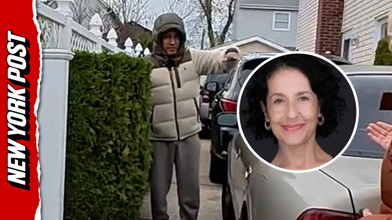 An unidentified man outside the Huntington home of 83-year-old Maria ...