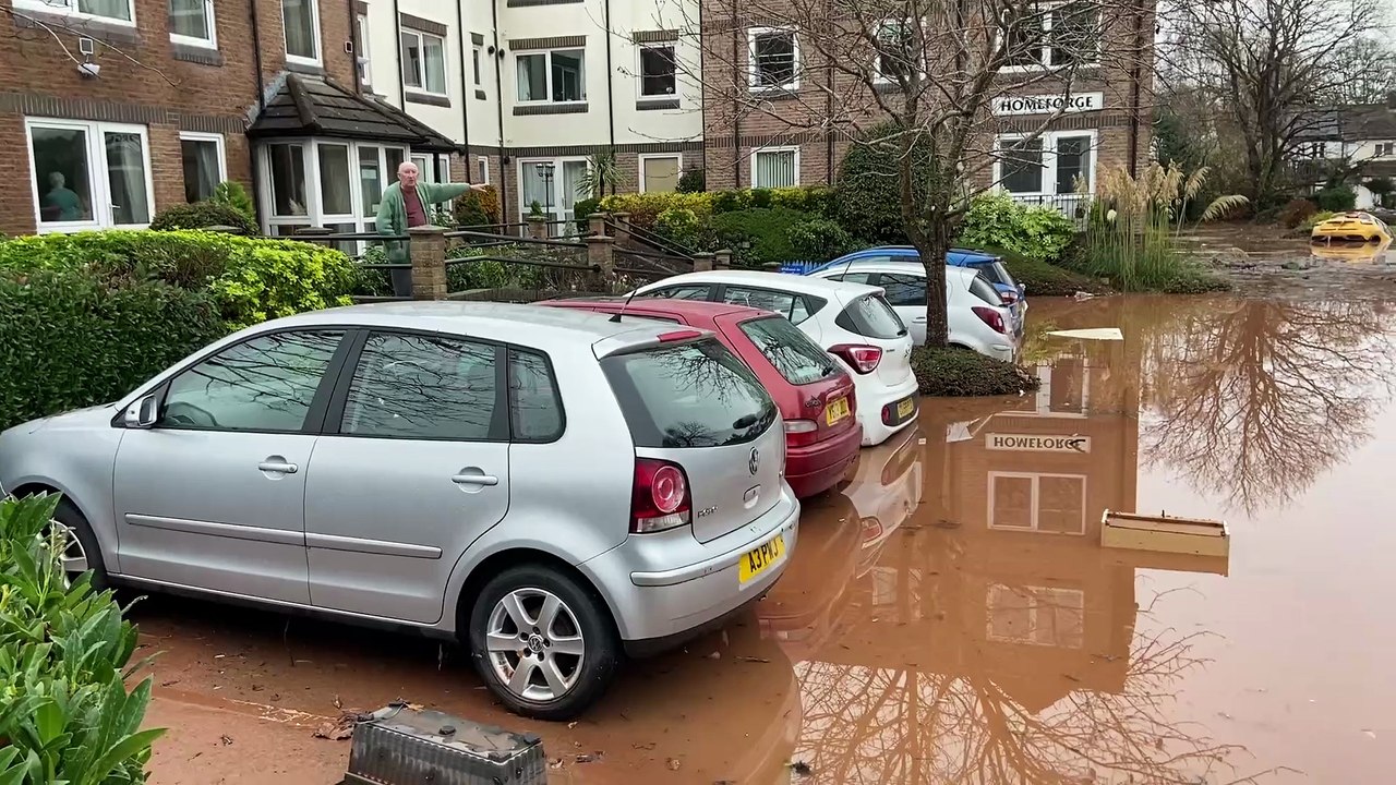 Eight cars were completely submerged under floodwater at the bottom of ...