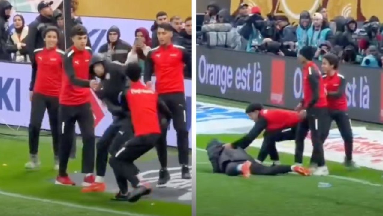 Senegal sub goalkeeper tackled by Moroccan ball boys during dramatic ...