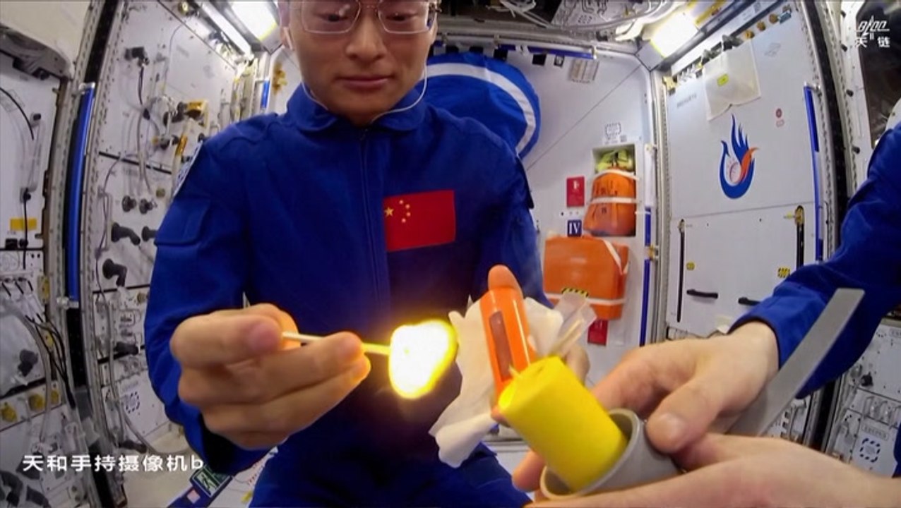 Chinese Astronaut Lights Candle With Match On Tiangong Space Station To ...